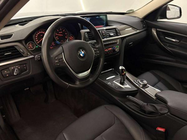 Black BMW 320 2013 in Marijampole, with an engine capacity of 2.00 L and mileage of 220 thousand km for 9250 €, photo 2 on AUTOMOTO.COM.LV