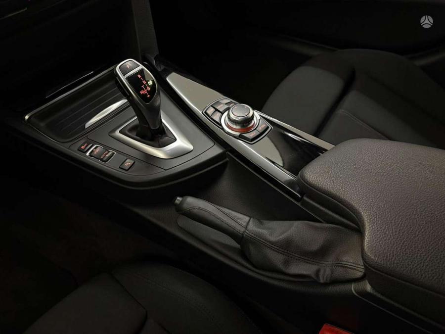 Black BMW 320 2013 in Marijampole, with an engine capacity of 2.00 L and mileage of 284 thousand km for 8450 €, photo 13 on AUTOMOTO.COM.LV