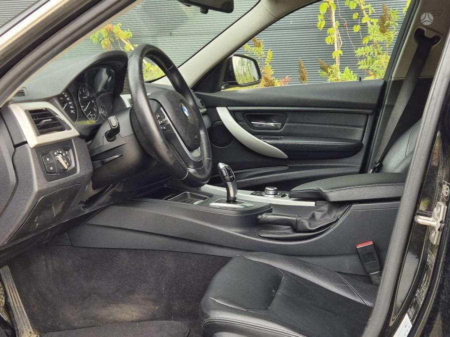 Black BMW 320 2013 in Vilnius, with an engine capacity of 2.00 L and mileage of 298 thousand km for 6999 €, photo 6 on AUTOMOTO.COM.LV