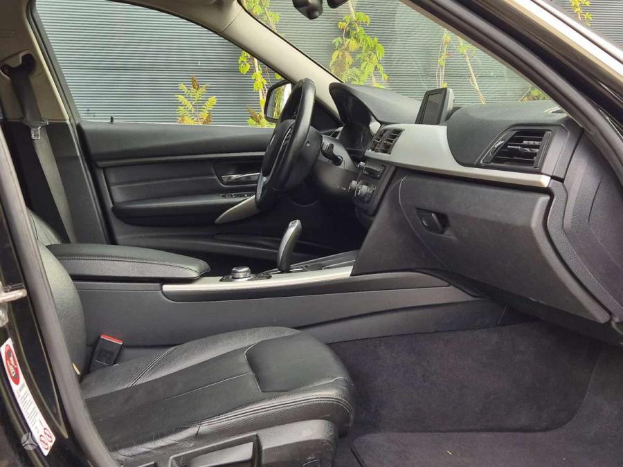 Black BMW 320 2013 in Vilnius, with an engine capacity of 2.00 L and mileage of 298 thousand km for 6999 €, photo 8 on AUTOMOTO.COM.LV