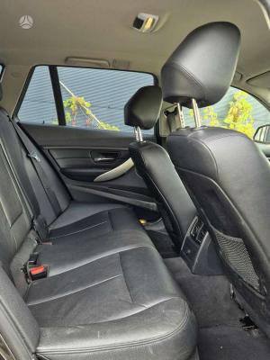 Black BMW 320 2013 in Vilnius, with an engine capacity of 2.00 L and mileage of 298 thousand km for 6999 €, photo 9 on AUTOMOTO.COM.LV