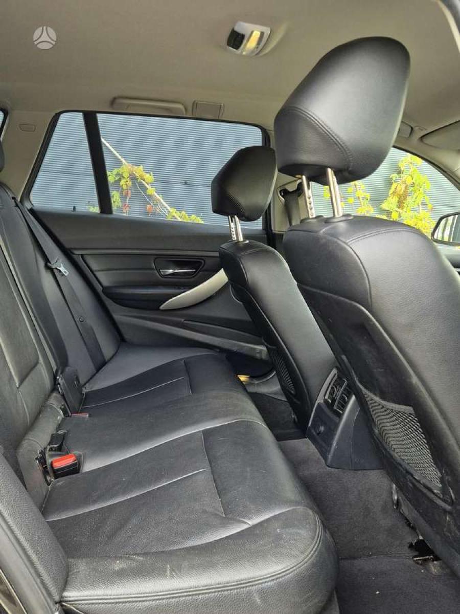 Black BMW 320 2013 in Vilnius, with an engine capacity of 2.00 L and mileage of 298 thousand km for 6999 €, photo 9 on AUTOMOTO.COM.LV