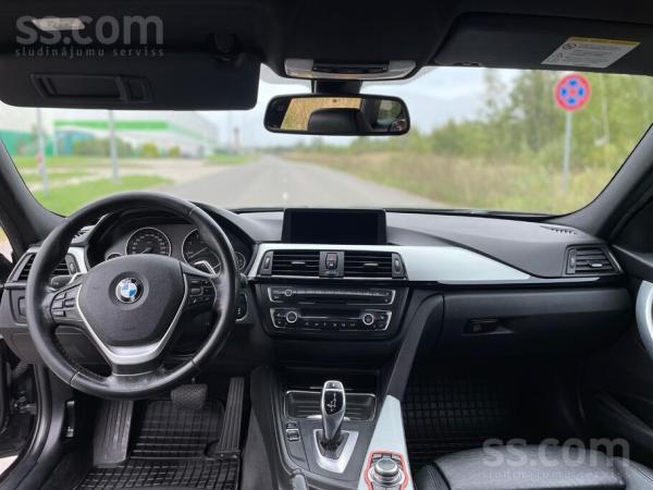 Black BMW 320 2013 in Dobele, with an engine capacity of 2.00 L and mileage of 400 thousand km for 8490 €, photo 10 on AUTOMOTO.COM.LV