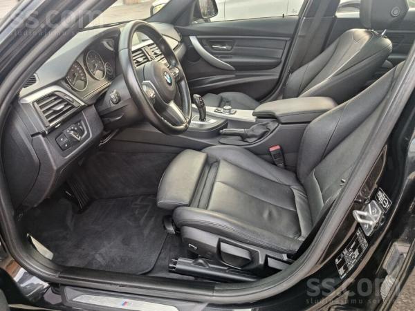 Black BMW 320 2013 in Riga, with an engine capacity of 2.00 L and mileage of 300 thousand km for 9400 €, photo 7 on AUTOMOTO.COM.LV