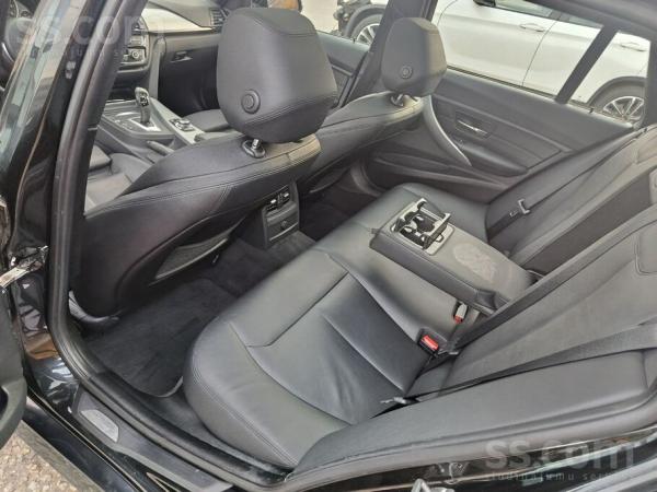 Black BMW 320 2013 in Riga, with an engine capacity of 2.00 L and mileage of 300 thousand km for 9400 €, photo 10 on AUTOMOTO.COM.LV