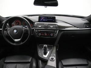 Black BMW 320 2014 in Vilnius, with an engine capacity of 2.00 L and mileage of 229 thousand km for 10899 €, photo 3 on AUTOMOTO.COM.LV