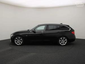 Black BMW 320 2014 in Vilnius, with an engine capacity of 2.00 L and mileage of 229 thousand km for 10899 €, photo 7 on AUTOMOTO.COM.LV