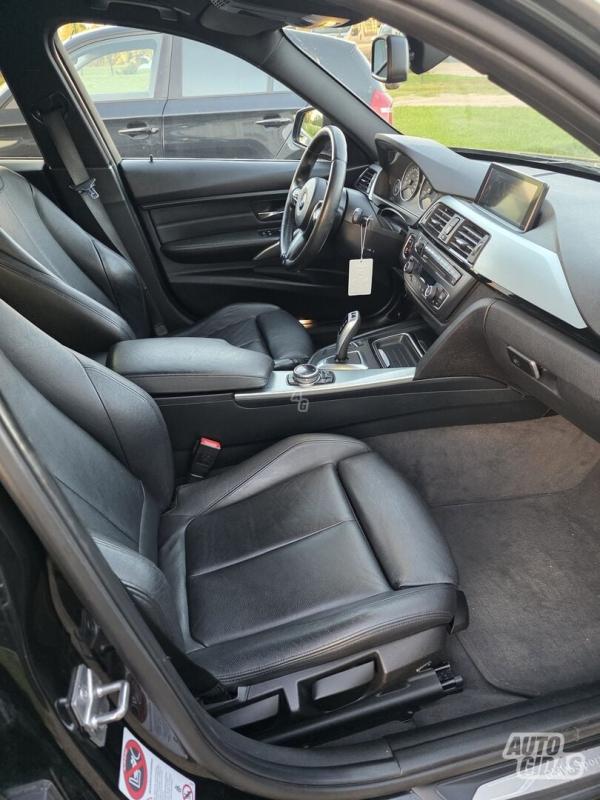 Black BMW 320 2014 in Vievis, with an engine capacity of 2.00 L and mileage of 364 thousand km for 8150 €, photo 6 on AUTOMOTO.COM.LV