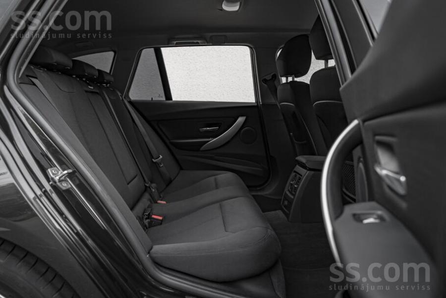 Black BMW 320 2014 in Riga, with an engine capacity of 2.00 L and mileage of 274 thousand km for 8250 €, photo 11 on AUTOMOTO.COM.LV
