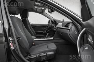 Black BMW 320 2014 in Riga, with an engine capacity of 2.00 L and mileage of 274 thousand km for 8250 €, photo 12 on AUTOMOTO.COM.LV