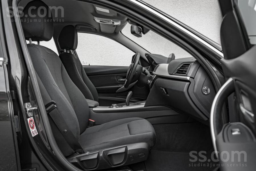Black BMW 320 2014 in Riga, with an engine capacity of 2.00 L and mileage of 274 thousand km for 8250 €, photo 12 on AUTOMOTO.COM.LV