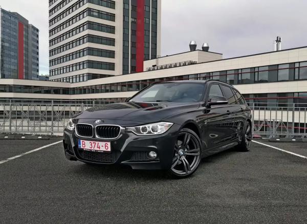 Black BMW 320 2014 in Riga, with an engine capacity of 2.00 L and mileage of 241 thousand km for 10590 €, photo 5 on AUTOMOTO.COM.LV
