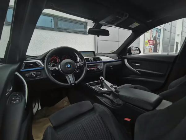 Black BMW 320 2014 in Riga, with an engine capacity of 2.00 L and mileage of 241 thousand km for 10590 €, photo 8 on AUTOMOTO.COM.LV
