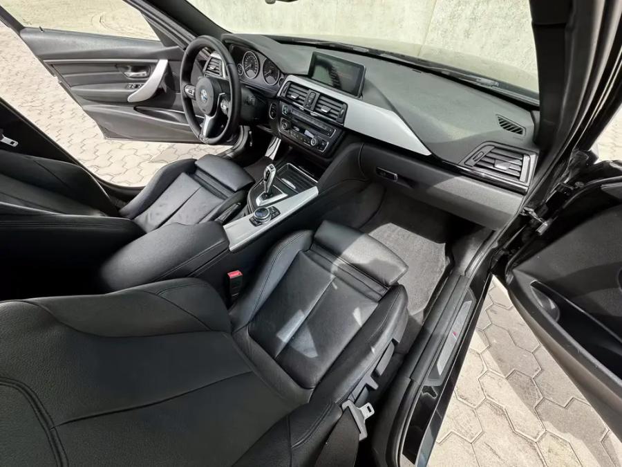 Black BMW 320 2014 in Riga, with an engine capacity of 2.00 L and mileage of 260 thousand km for 10300 €, photo 10 on AUTOMOTO.COM.LV