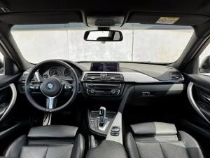 Black BMW 320 2014 in Riga, with an engine capacity of 2.00 L and mileage of 260 thousand km for 10300 €, photo 11 on AUTOMOTO.COM.LV