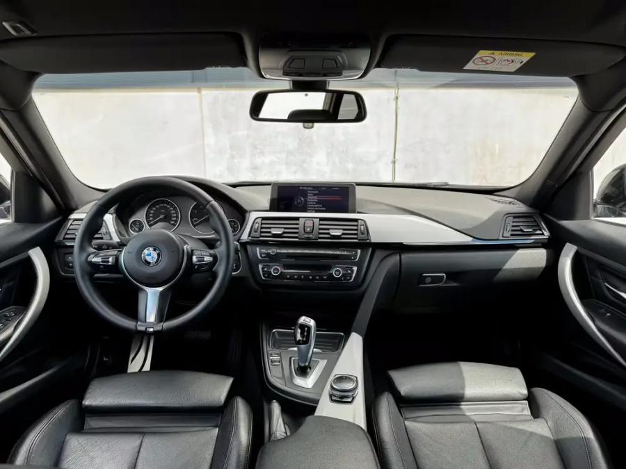 Black BMW 320 2014 in Riga, with an engine capacity of 2.00 L and mileage of 260 thousand km for 10300 €, photo 11 on AUTOMOTO.COM.LV