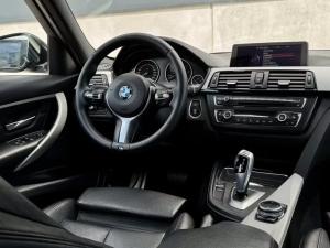 Black BMW 320 2014 in Riga, with an engine capacity of 2.00 L and mileage of 260 thousand km for 10300 €, photo 12 on AUTOMOTO.COM.LV