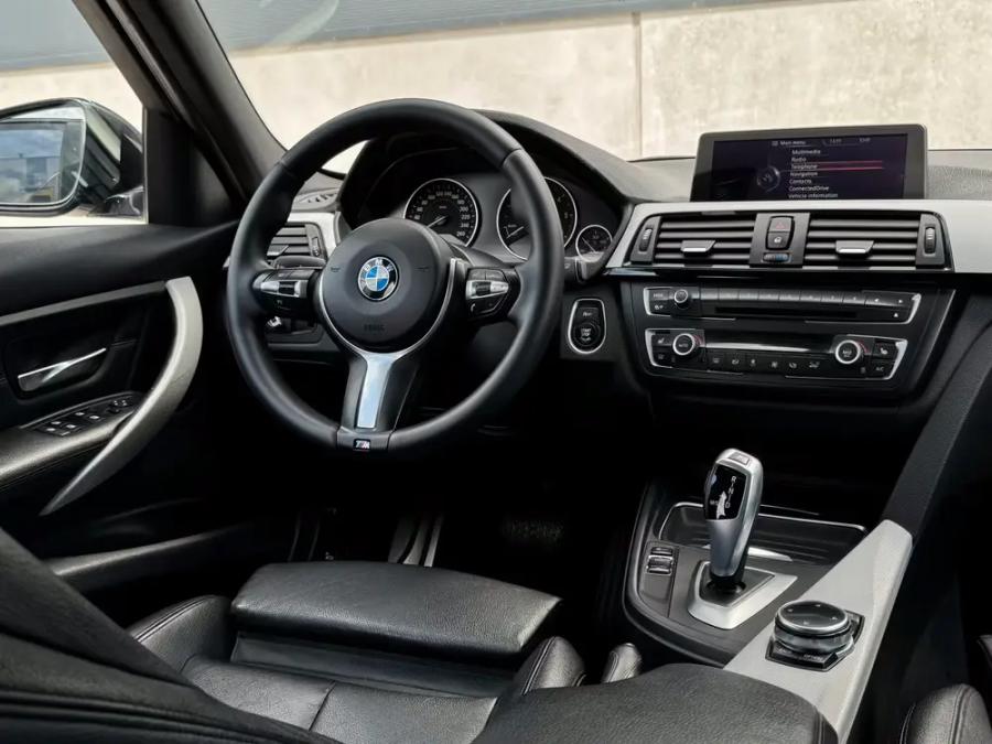 Black BMW 320 2014 in Riga, with an engine capacity of 2.00 L and mileage of 260 thousand km for 10300 €, photo 12 on AUTOMOTO.COM.LV