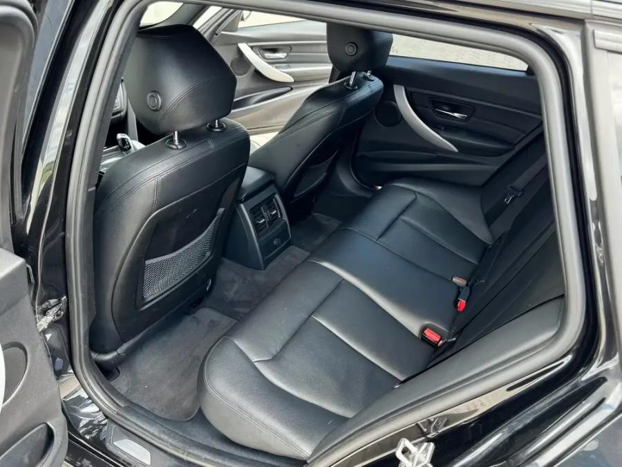Black BMW 320 2014 in Riga, with an engine capacity of 2.00 L and mileage of 260 thousand km for 10300 €, photo 15 on AUTOMOTO.COM.LV