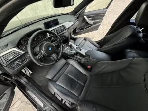 Black BMW 320 2014 in Riga, with an engine capacity of 2.00 L and mileage of 260 thousand km for 10300 €, photo 22 on AUTOMOTO.COM.LV