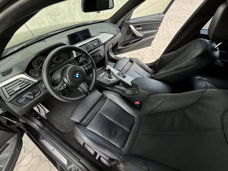Black BMW 320 2014 in Riga, with an engine capacity of 2.00 L and mileage of 260 thousand km for 10300 €, photo 22 on AUTOMOTO.COM.LV