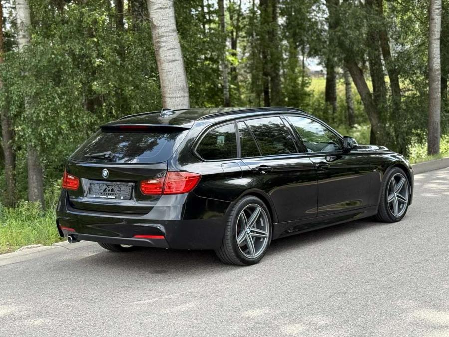 Black BMW 320 2014 in Ukmerge, with an engine capacity of 2.00 L and mileage of 290 thousand km for 7950 €, photo 6 on AUTOMOTO.COM.LV