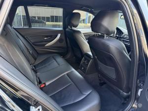 Black BMW 320 2014 in Ukmerge, with an engine capacity of 2.00 L and mileage of 290 thousand km for 7950 €, photo 13 on AUTOMOTO.COM.LV
