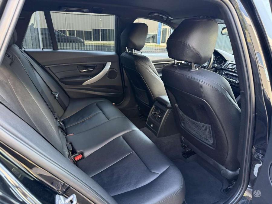 Black BMW 320 2014 in Ukmerge, with an engine capacity of 2.00 L and mileage of 290 thousand km for 7950 €, photo 13 on AUTOMOTO.COM.LV