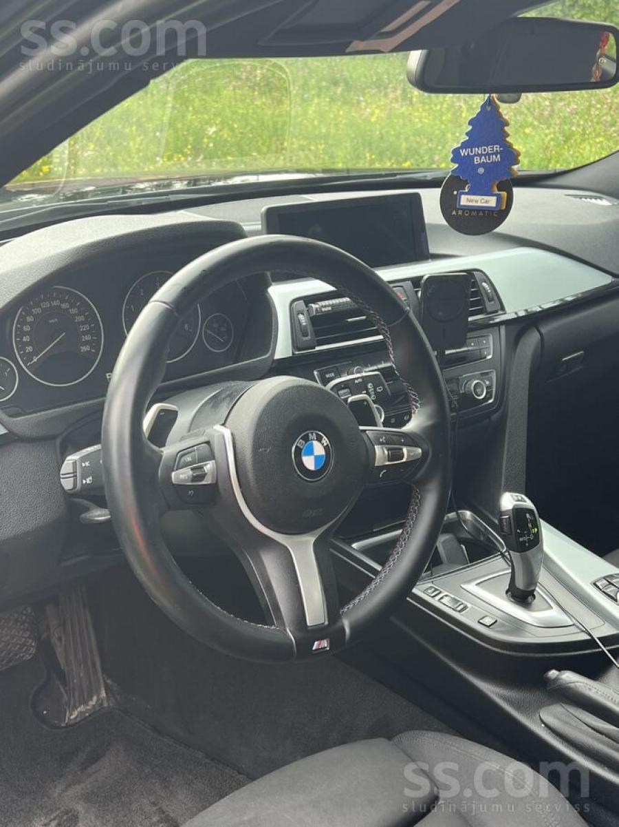 Black BMW 320 2014 in Bauska, with an engine capacity of 2.00 L and mileage of 365 thousand km for 10599 €, photo 6 on AUTOMOTO.COM.LV