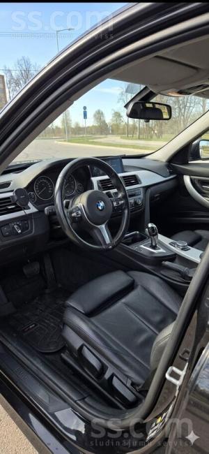 Black BMW 320 2015 in Riga, with an engine capacity of 2.00 L and mileage of 261 thousand km for 13500 €, photo 7 on AUTOMOTO.COM.LV