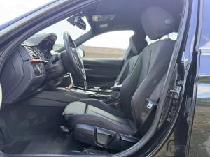 Black BMW 320 2015 in Riga, with an engine capacity of 2.00 L and mileage of 239 thousand km for 9995 €, photo 12 on AUTOMOTO.COM.LV