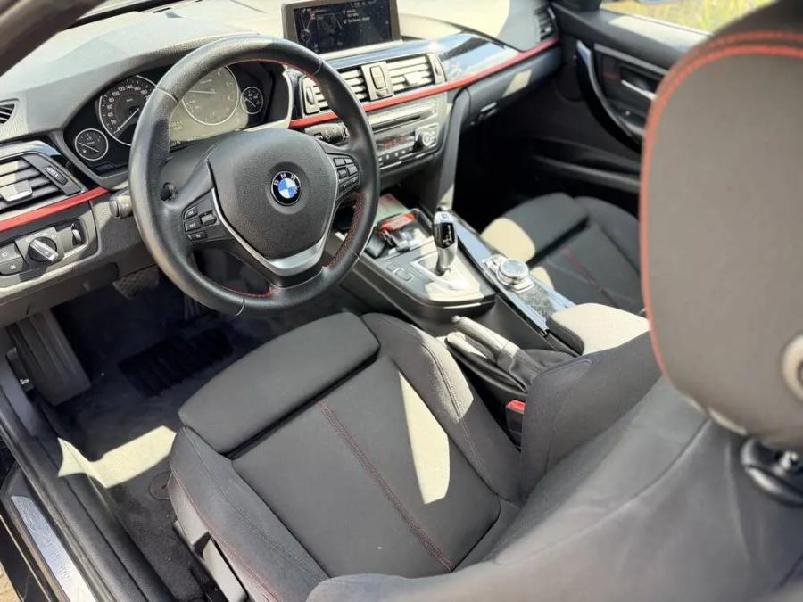 Black BMW 320 2015 in Riga, with an engine capacity of 2.00 L and mileage of 239 thousand km for 9995 €, photo 13 on AUTOMOTO.COM.LV