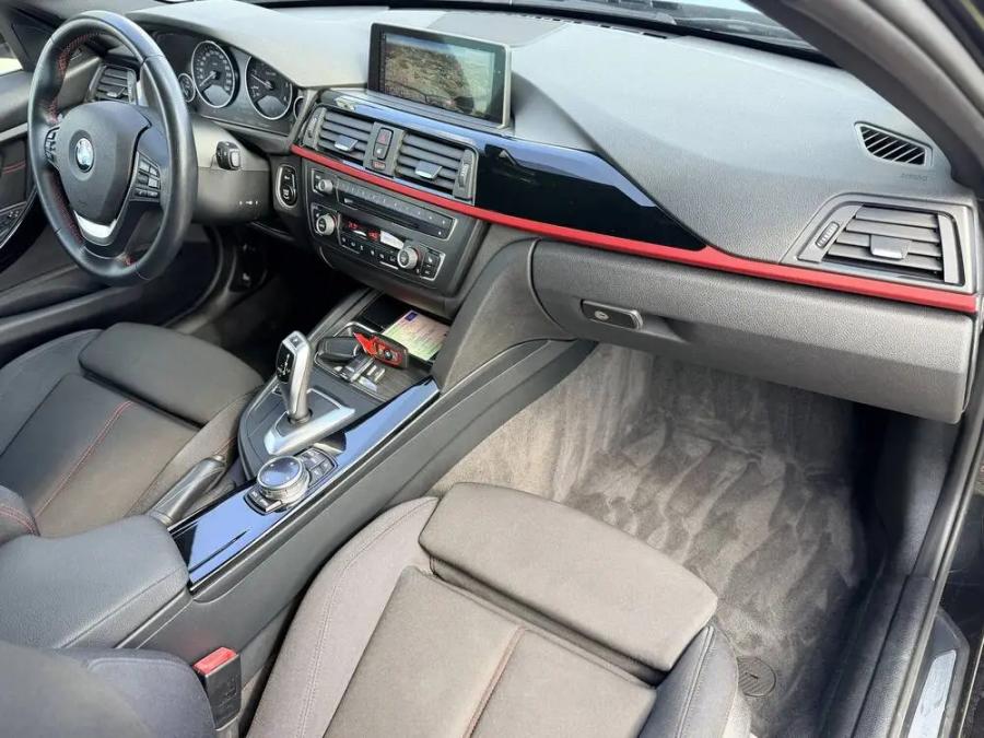 Black BMW 320 2015 in Riga, with an engine capacity of 2.00 L and mileage of 239 thousand km for 9995 €, photo 24 on AUTOMOTO.COM.LV