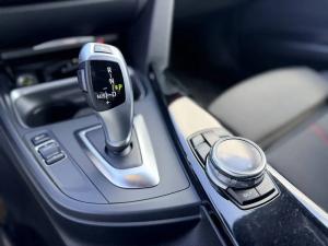 Black BMW 320 2015 in Riga, with an engine capacity of 2.00 L and mileage of 239 thousand km for 9995 €, photo 28 on AUTOMOTO.COM.LV