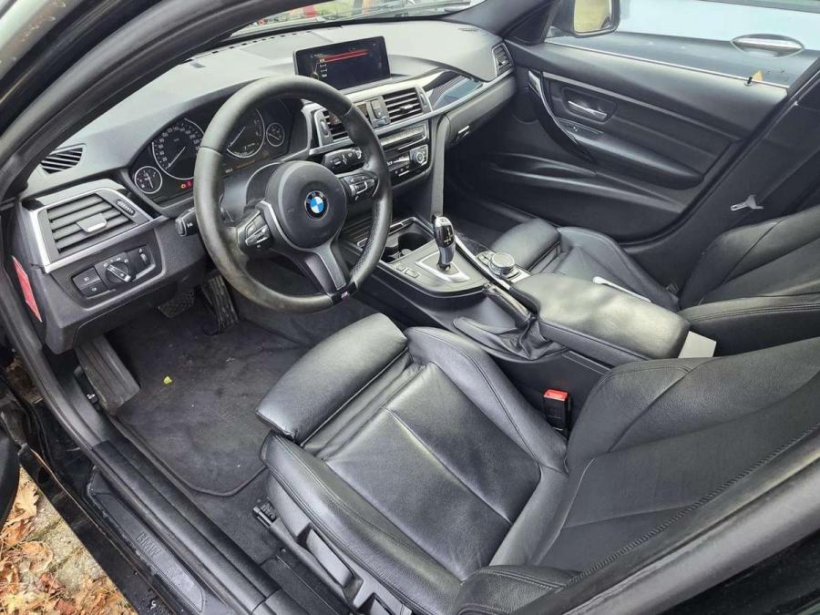 Black BMW 320 2016 in Ukmerge, with an engine capacity of 2.00 L and mileage of 285 thousand km for 10900 €, photo 5 on AUTOMOTO.COM.LV
