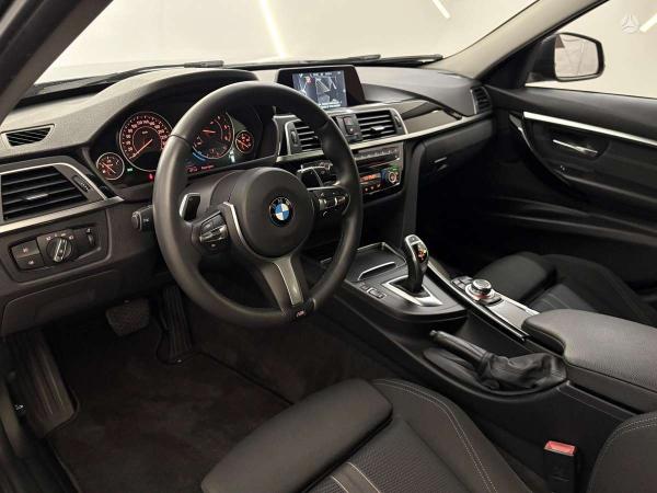 Black BMW 320 2016 in Marijampole, with an engine capacity of 2.00 L and mileage of 292 thousand km for 9999 €, photo 2 on AUTOMOTO.COM.LV
