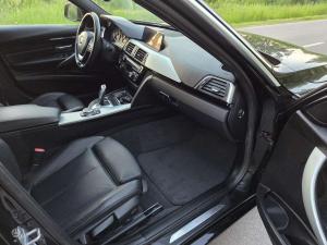 Black BMW 320 2016 in Kaunas, with an engine capacity of 2.00 L and mileage of 246 thousand km for 10500 €, photo 13 on AUTOMOTO.COM.LV