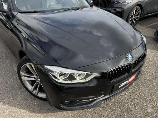 Black BMW 320 2016 in Vilnius, with an engine capacity of 2.00 L and mileage of 287 thousand km for 11390 €, photo 6 on AUTOMOTO.COM.LV