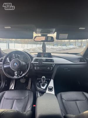Black BMW 320 2017 in Vilnius, with an engine capacity of 2.00 L and mileage of 203 thousand km for 11800 €, photo 14 on AUTOMOTO.COM.LV