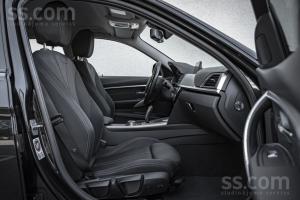 Black BMW 320 2017 in Riga, with an engine capacity of 2.00 L and mileage of 282 thousand km for 11990 €, photo 12 on AUTOMOTO.COM.LV