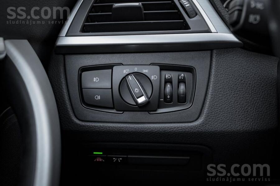 Black BMW 320 2017 in Riga, with an engine capacity of 2.00 L and mileage of 282 thousand km for 11990 €, photo 30 on AUTOMOTO.COM.LV