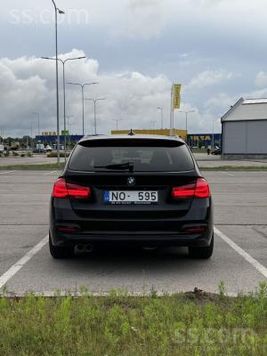 Black BMW 320 2017 in Riga, with an engine capacity of 2.00 L and mileage of 300 thousand km for 11300 €, photo 6 on AUTOMOTO.COM.LV