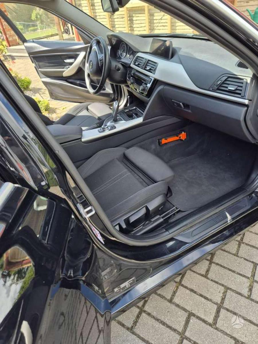Black BMW 320 2017 in Marijampole, with an engine capacity of 2.00 L and mileage of 300 thousand km for 9900 €, photo 13 on AUTOMOTO.COM.LV