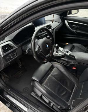 Black BMW 320 2018 in Vilnius, with an engine capacity of 2.00 L and mileage of 267 thousand km for 14330 €, photo 18 on AUTOMOTO.COM.LV