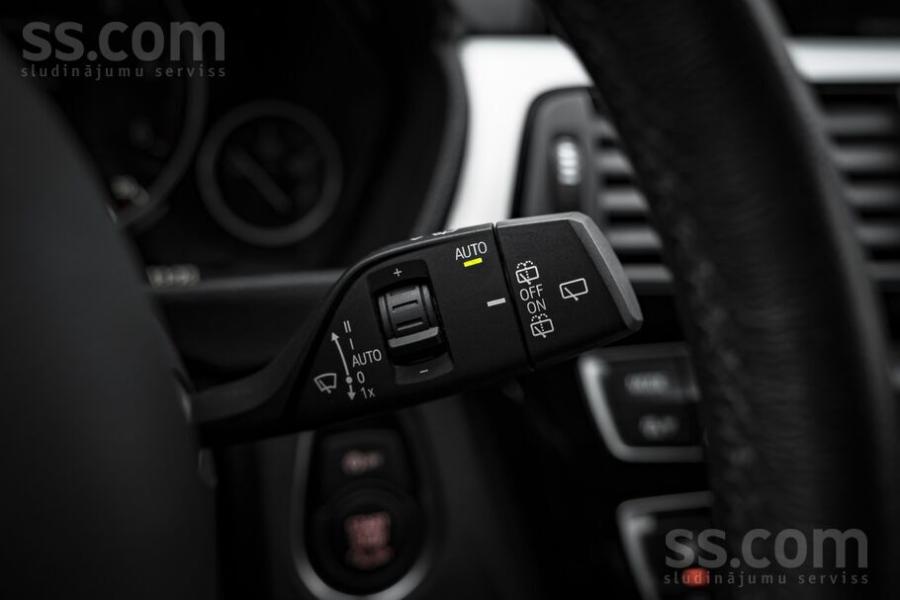 Black BMW 320 2018 in Riga, with an engine capacity of 2.00 L and mileage of 192 thousand km for 16450 €, photo 21 on AUTOMOTO.COM.LV
