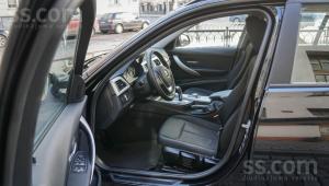 Black BMW 320 2018 in Riga, with an engine capacity of 2.00 L and mileage of 292 thousand km for 10950 €, photo 8 on AUTOMOTO.COM.LV