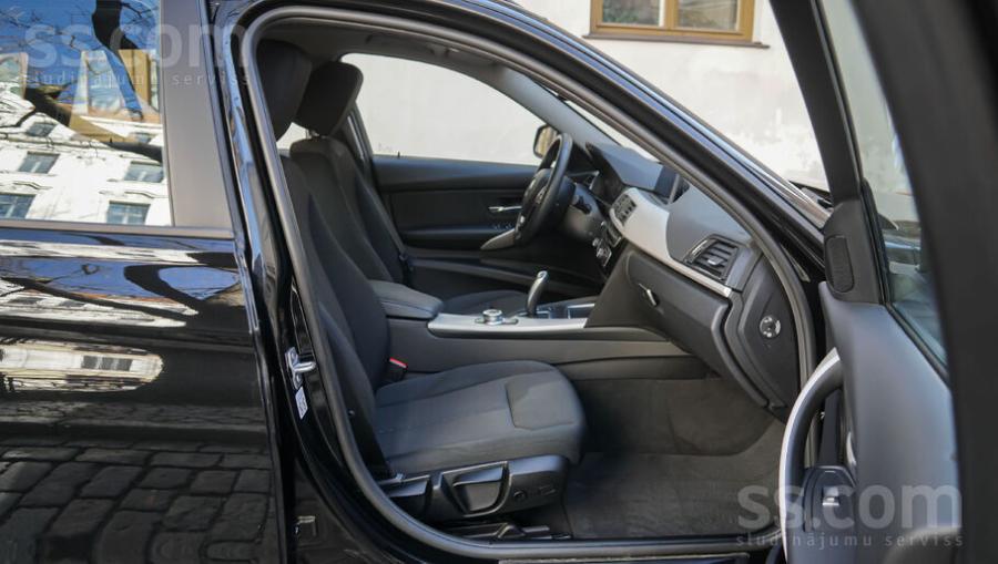 Black BMW 320 2018 in Riga, with an engine capacity of 2.00 L and mileage of 292 thousand km for 10950 €, photo 13 on AUTOMOTO.COM.LV