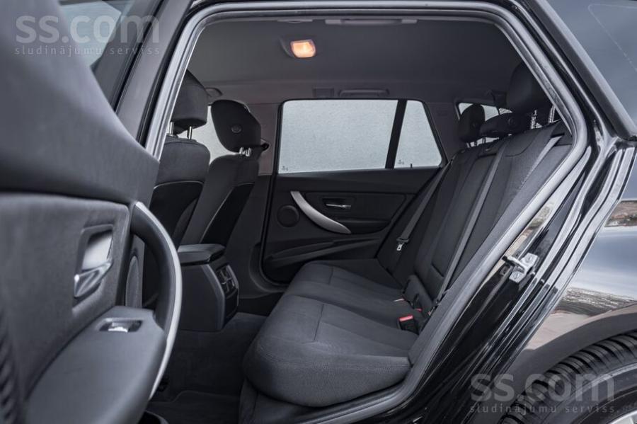 Black BMW 320 2018 in Riga, with an engine capacity of 2.00 L and mileage of 98 thousand km for 18500 €, photo 12 on AUTOMOTO.COM.LV