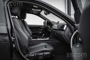 Black BMW 320 2018 in Riga, with an engine capacity of 2.00 L and mileage of 192 thousand km for 15990 €, photo 13 on AUTOMOTO.COM.LV