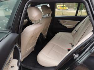 Black BMW 320 2018 in Riga, with an engine capacity of 2.00 L and mileage of 223 thousand km for 13900 €, photo 6 on AUTOMOTO.COM.LV